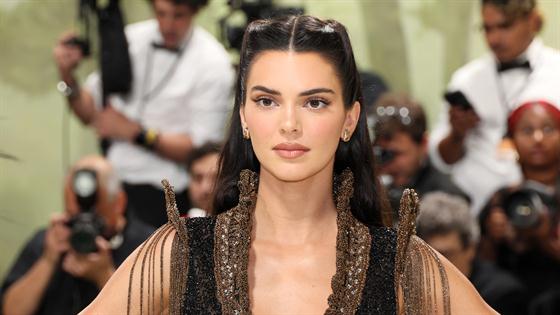 2024 Met Gala: Kendall Jenner Stuns in Archival Couture With Plunging Neckline